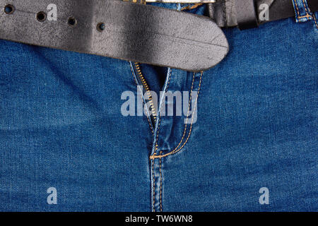 Denim jeans with belt and open fly Stock Photo - Alamy
