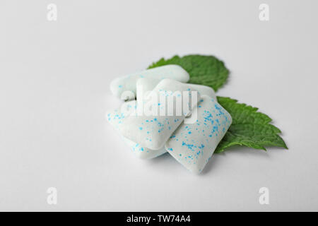 Mint chewing gum on light background Stock Photo - Alamy