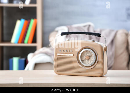 Stylish radio receiver on office table Stock Photo - Alamy