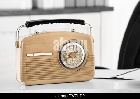 Stylish radio receiver on office table Stock Photo - Alamy