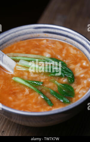 Traditional Chinese snack tomato lumpy soup Stock Photo - Alamy