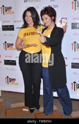 Fran Drescher, left, and Sharon Osbourne pose together before the Stand ...