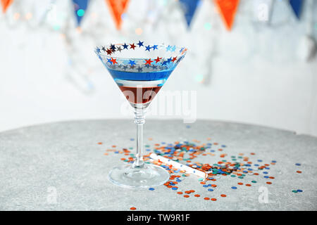 Layered cocktail in colors of American flag on table Stock Photo - Alamy