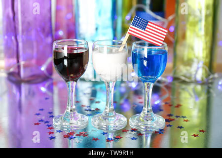 Cocktails in colors of American flag on table Stock Photo - Alamy