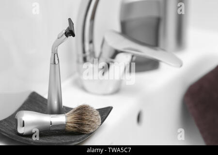 Shaving accessories for man on sink Stock Photo - Alamy