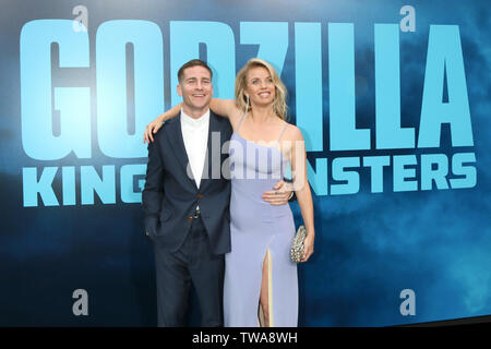 (L-R) Zach Shields and Kelli Garner at the "Godzilla: King of the ...