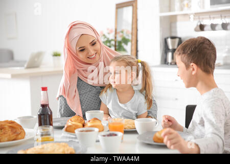 Muslim family having breakfast together at home Stock Photo - Alamy