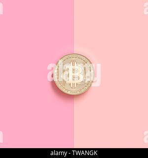 Pink bitcoin gold coin on wood wooden table over forest trees blur. bit ...
