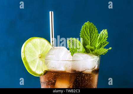 Coca Coke cocktail in a tall glass cuba libre. refreshing summer drink ...