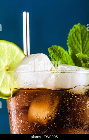 Coca Coke cocktail in a tall glass cuba libre. refreshing summer drink ...