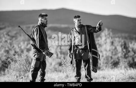 Gamekeepers walk mountains background. Gamekeepers sunny fall day ...