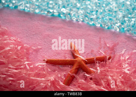Microplastic pollution in ocean sea concept pink starfish on the beach ...