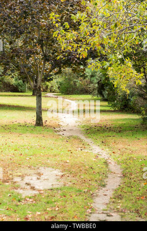 A beautiful view of a path heading to the white buildings of Milos ...