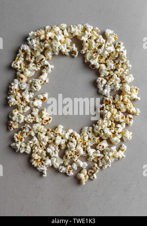 Word Pop written with Popcorn Stock Photo - Alamy