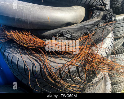 The detail picture of the old worn out tyre. The rubber is perished and ...