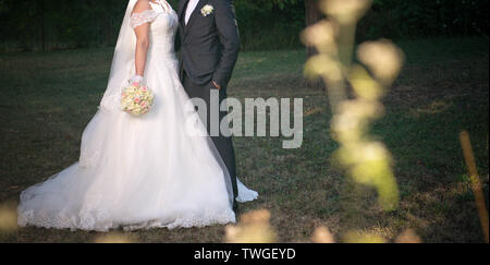 unrecognizable bride and groom pictured outdoor image soft focus Stock ...