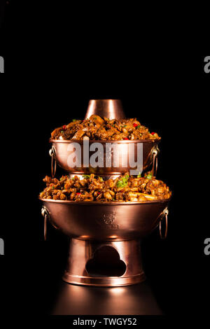 Carbon fire bullfrog pot Stock Photo - Alamy