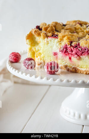 Piece of raspberry pie on a wooden table in warm summer sunlight Stock ...