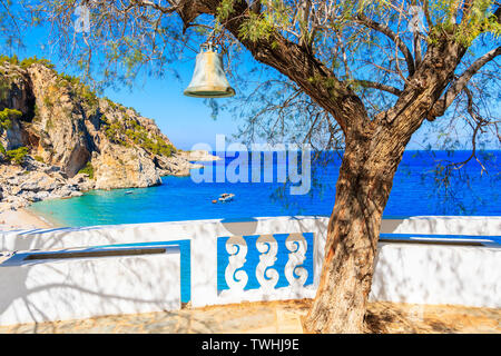 Pine tree hanging on a cliff over Agia Fotia beach, Ierapetra, Lasithi ...