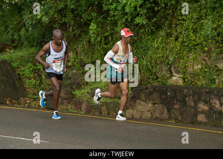 Durban, South Africa, 4 elite male athletes running in group, four ...