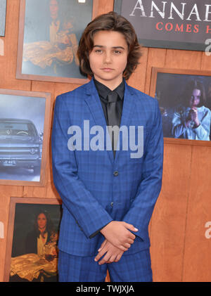 Luca Luhan attends the Annabelle Comes Home premiere on June 20, 2019 ...