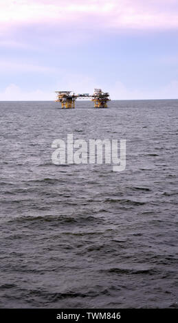 oil platform at middle ocean with beautiful sky Stock Photo - Alamy