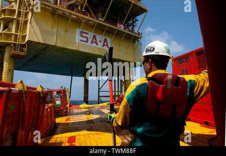 marine crew handling and arrange cargo on deck by using special tool ...