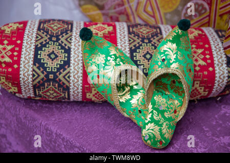 Traditional Arabic (aladdin) slippers on white background. Felt shoes ...