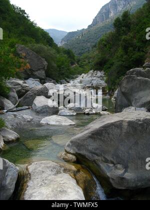 Blue river pool with ancient aqueduct behind Stock Photo - Alamy