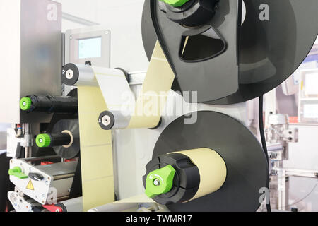 Fragment of the conveyor of sticking labeling machine. Abstract ...
