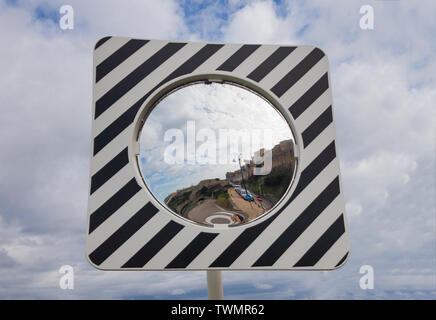 Round road mirror against the sky Stock Photo - Alamy