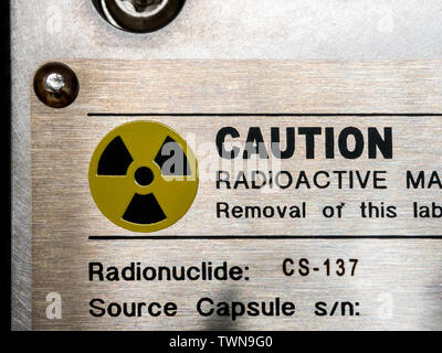 Radiation warning sign on the nameplate the mechanical container of ...