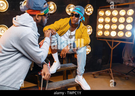 Black rappers in sunglasses, perfomance on stage Stock Photo - Alamy
