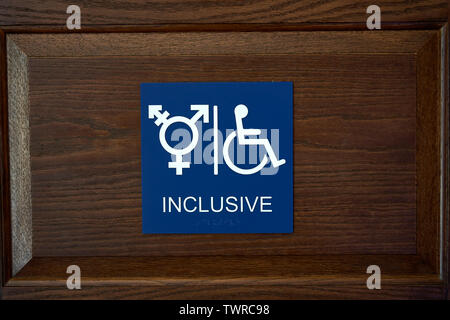 Sign outside a gender inclusive restroom Stock Photo - Alamy