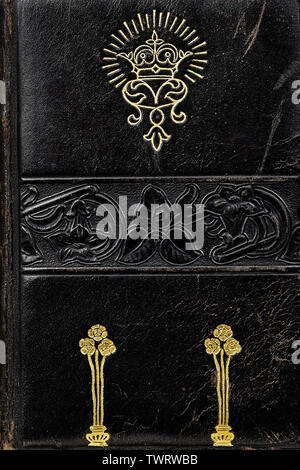 Old book with gold-engraved brown leather cover, side view Stock Photo ...