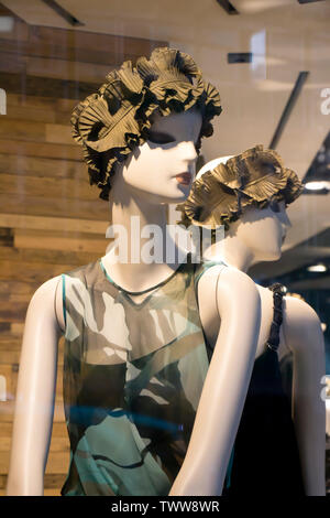 Closeup of dolls in window display Stock Photo - Alamy