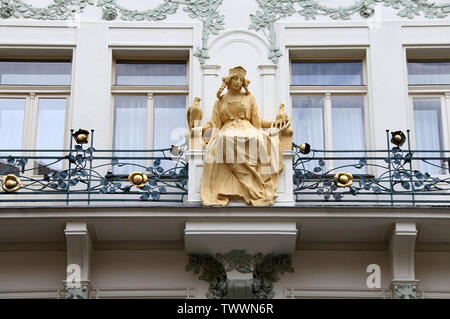 Princess Libuse sculpture on the facade of a building at Karlova Street ...
