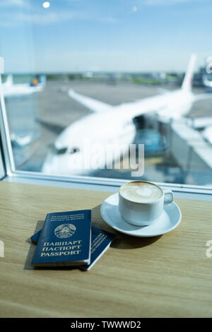 Cup of tea in airport's business lounge. Waiting for the flight ...