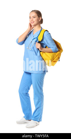 Young medical assistant with backpack on white background Stock Photo ...