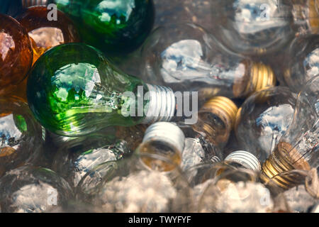 colored light bulbs laying on the ground Stock Photo - Alamy
