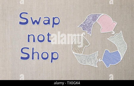 Swap not Shop text and symbol stitched on fabric, concept illustration ...