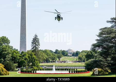 President Donald Trump returns to the White House North Portico on June ...