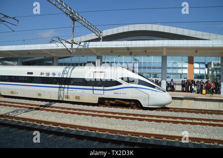 Harmony high-speed rail EMU train enters station Stock Photo - Alamy