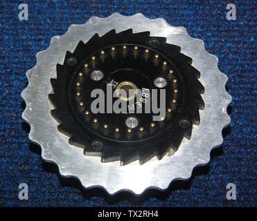 An Enigma machine rotor on display showing the internal wiring in Stock ...