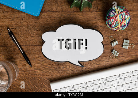 View from above paper speech bubble above computer keyboard on wooden ...