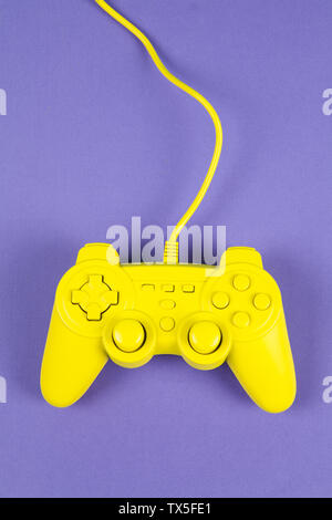 Gaming concept. Joystick on color background Stock Photo - Alamy