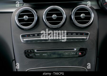 Centre console buttons in a car Stock Photo - Alamy
