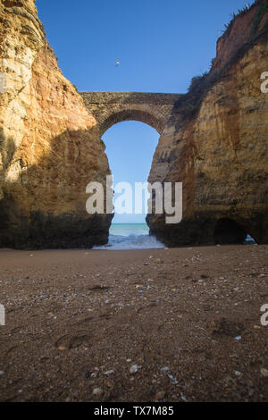 Bridge at a beach in Lagos, Portugal Stock Photo - Alamy