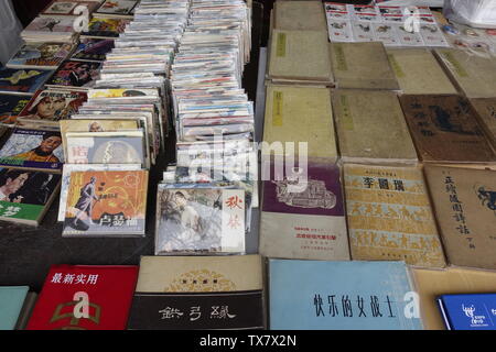 A little man's book sold in the used book market Stock Photo - Alamy