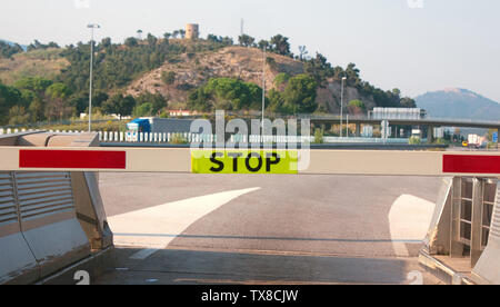 Paid highways in India. Terminal fare, toll road. Barrier with a ...